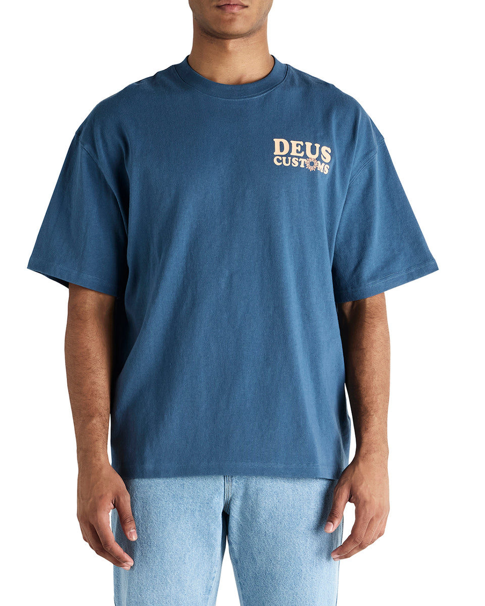 Tees | Deus Ex Machina | Greetings Tee - Indian Teal – Deus Ex Machina ...